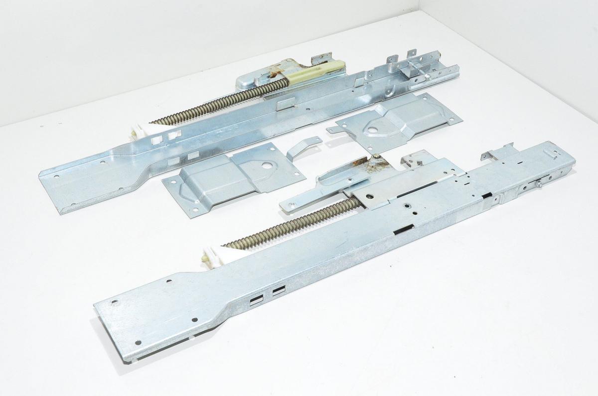 Spring loaded hinged hatch mechanism